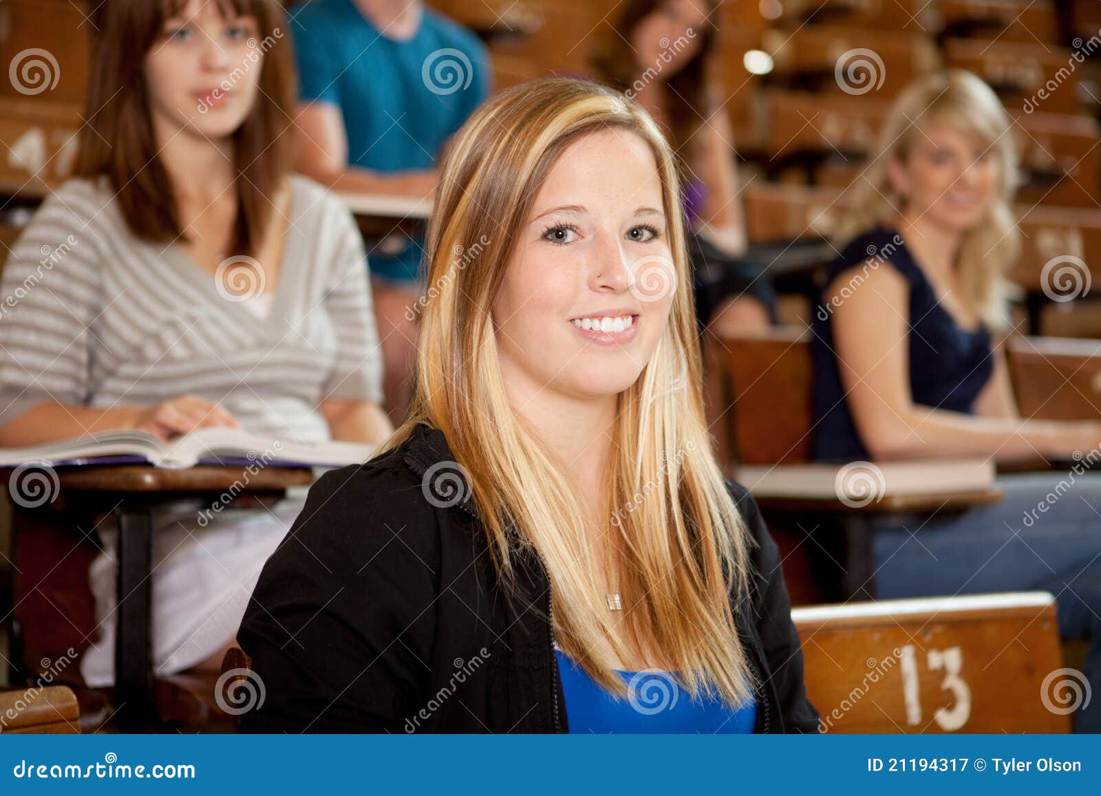 Smiling Student in Class stock image. Image of indoor - 21194317