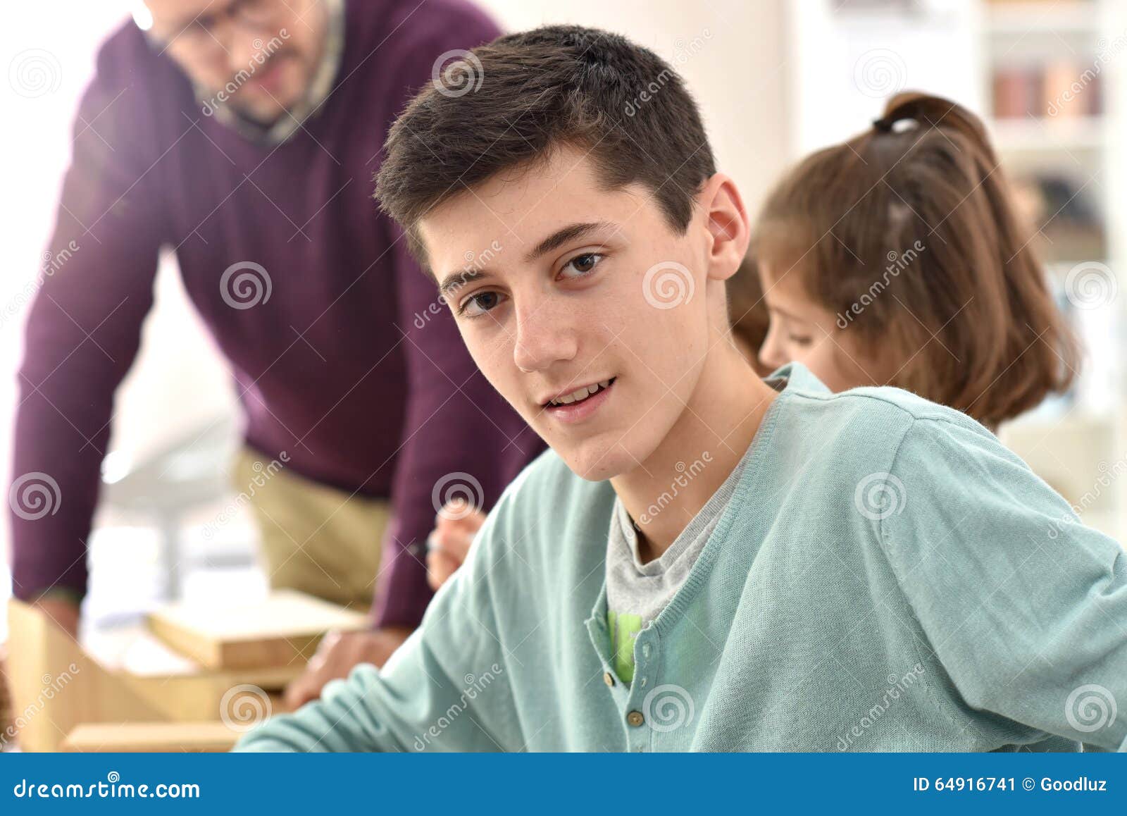 Smiling student in class stock image. Image of education - 64916741