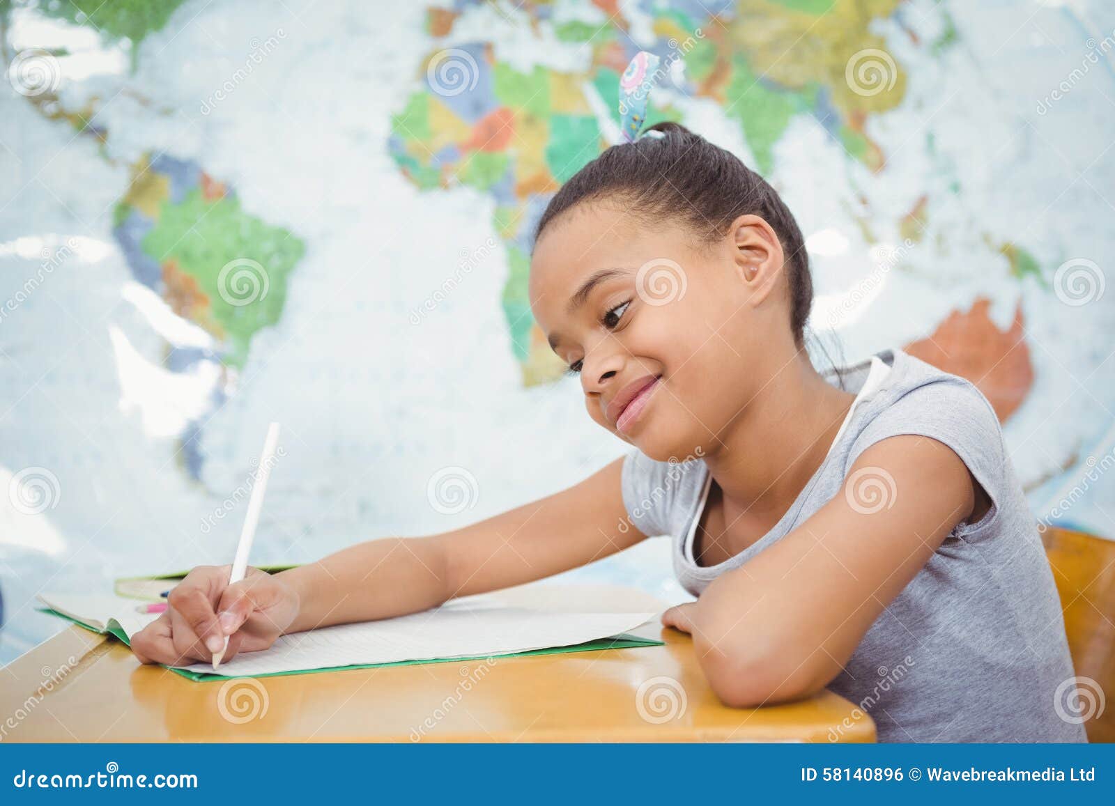 Smiling Student Doing Class Work Stock Photo - Image of pencil, lesson ...
