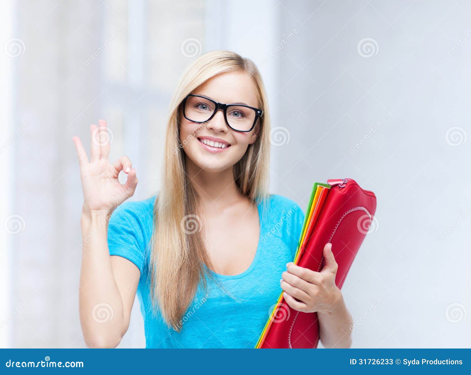Smiling Student with Folders Stock Image - Image of beautiful, colorful ...