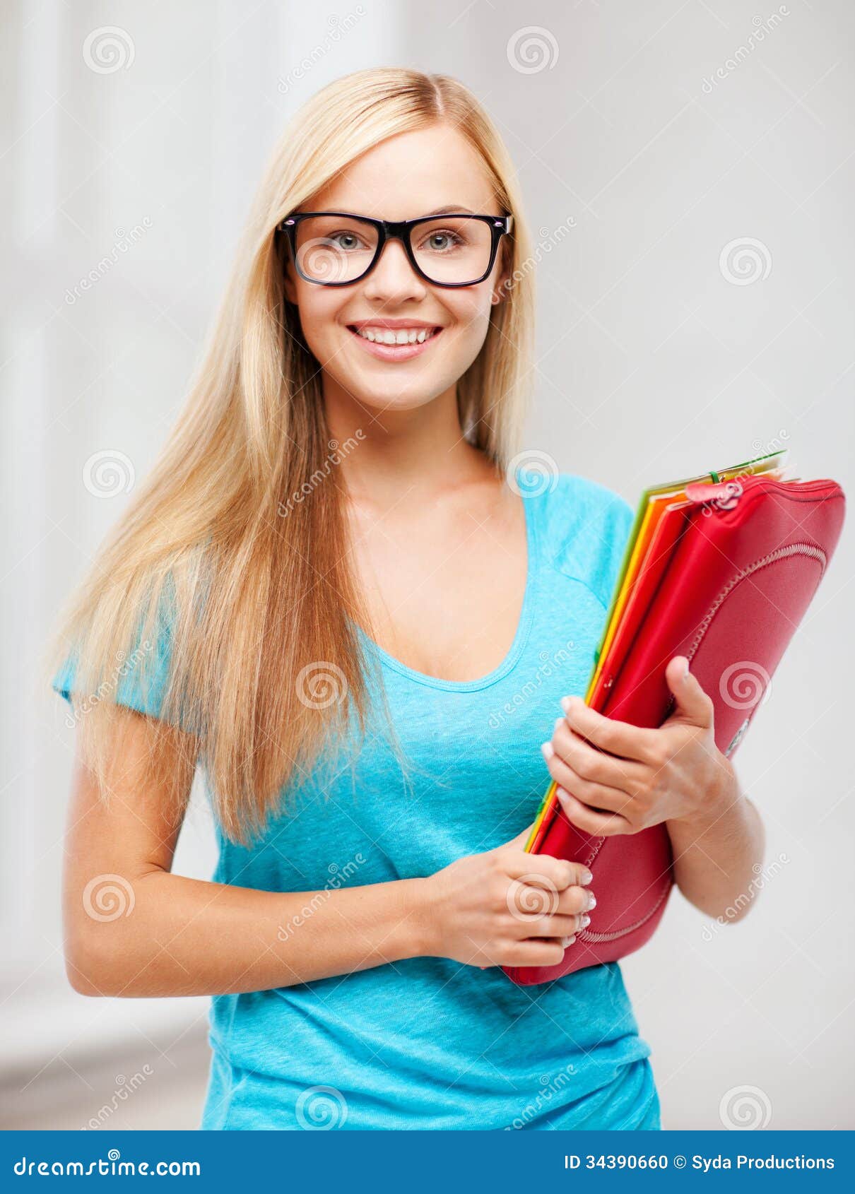 Smiling Student with Folders Stock Photo - Image of glasses, carefree ...