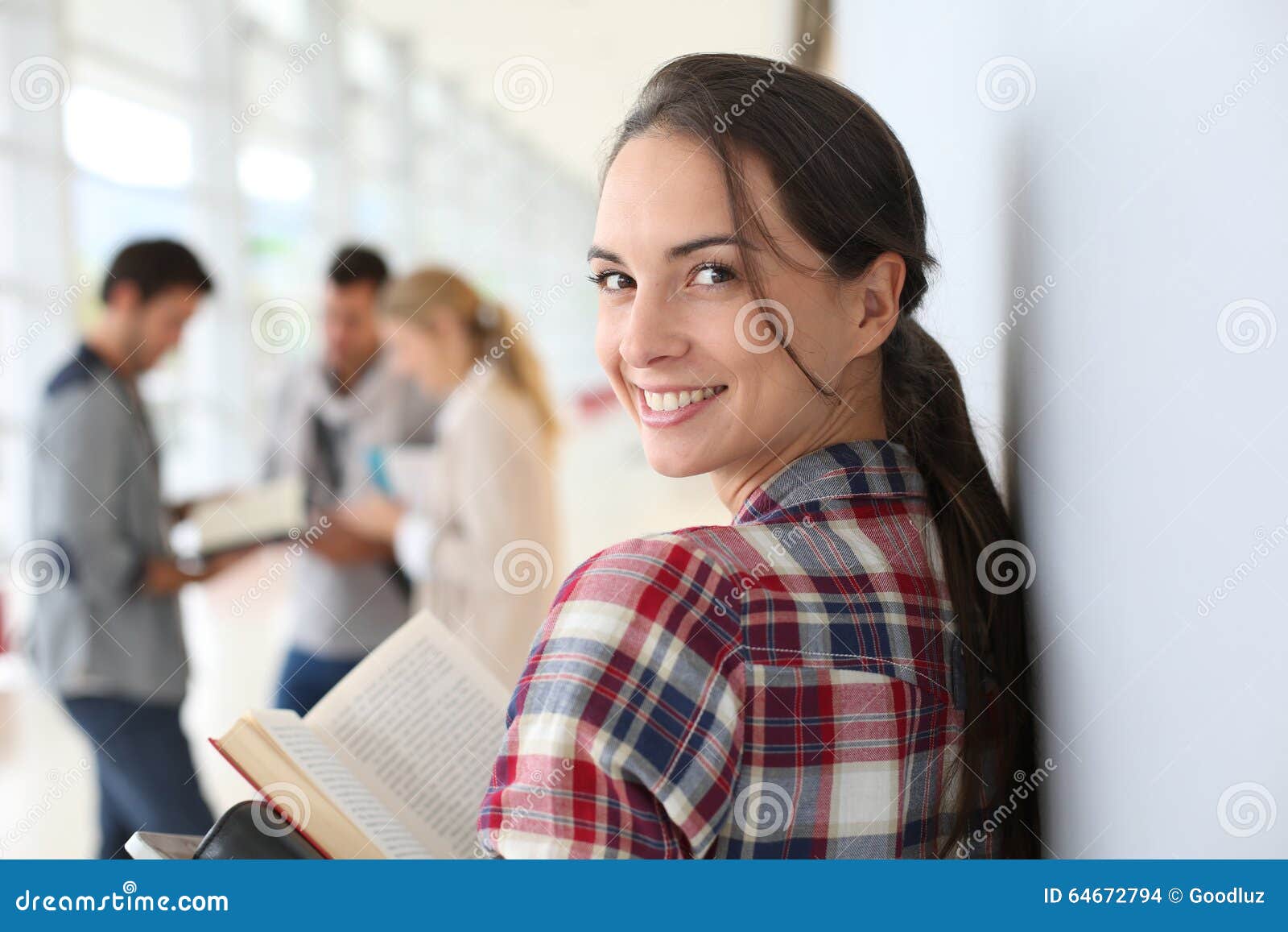 Smiling Student Girl in Hallway Stock Photo - Image of group, pretty ...