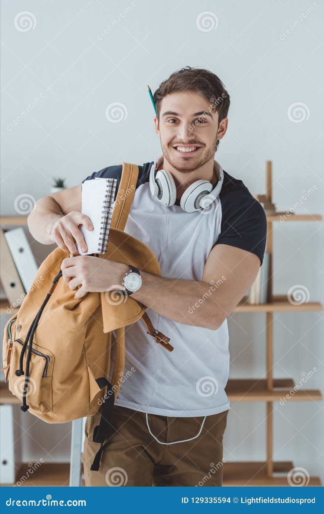 Smiling Student with Headphones Backpack Stock Photo - Image of ...