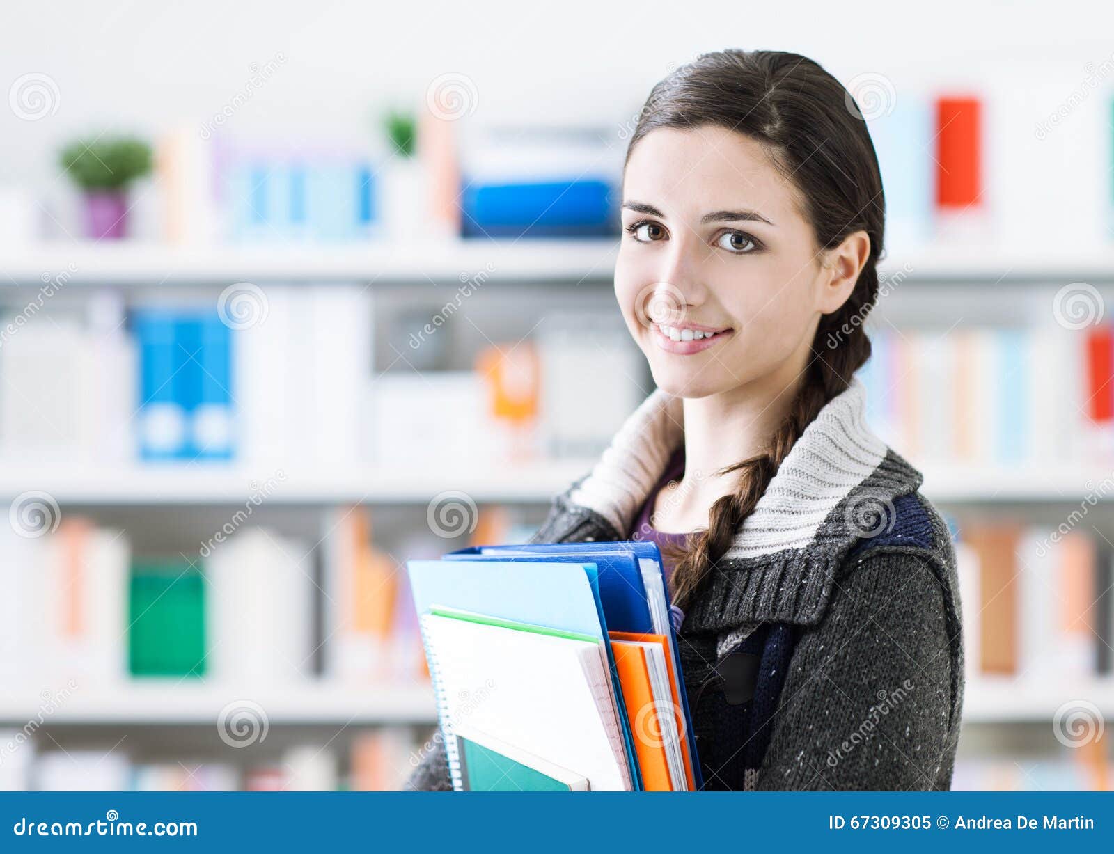 Smiling Student Holding Notebooks Stock Image - Image of beautiful ...