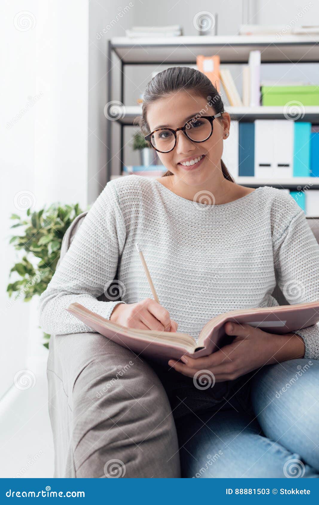 Smiling student at home stock image. Image of relax, homework - 88881503