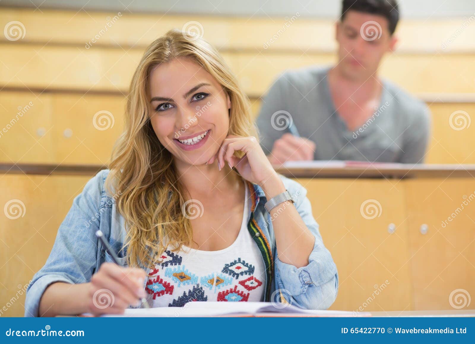 Smiling Student Looking at Camera Stock Photo - Image of book, cheerful ...