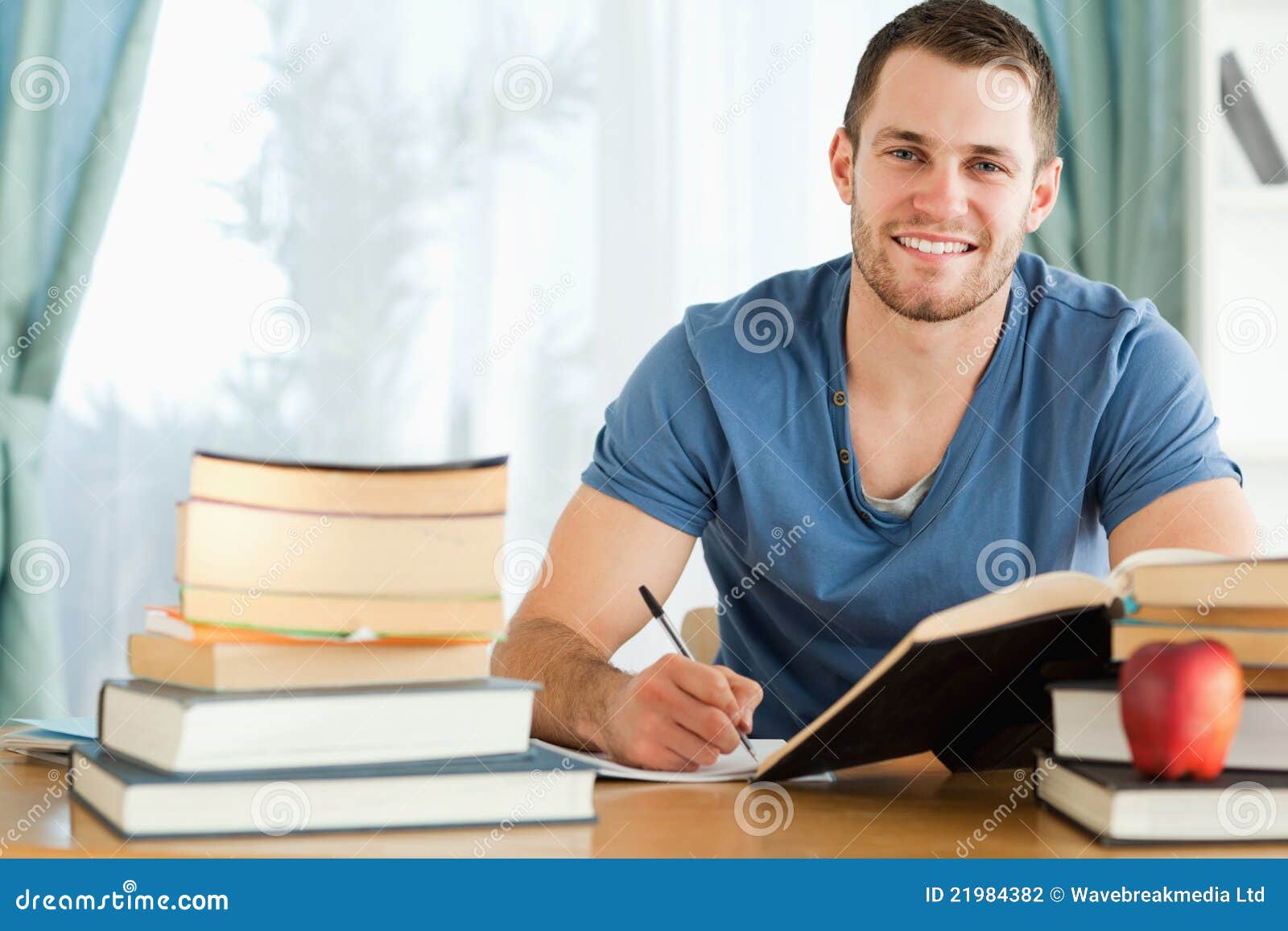Smiling Student Preparing for Test Stock Photo - Image of handsome ...