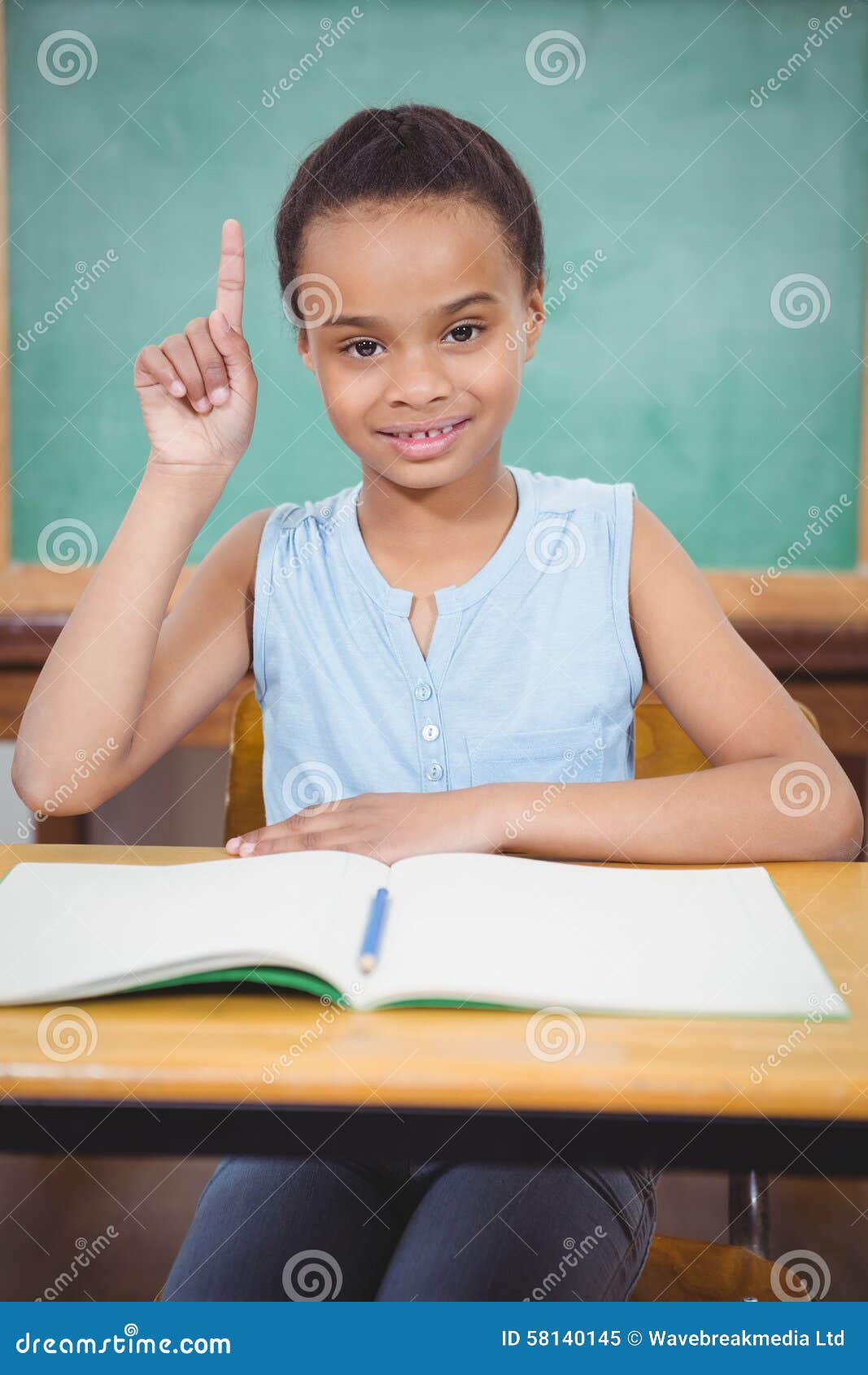 Smiling Student with a Rasied Hand Stock Image - Image of portrait ...