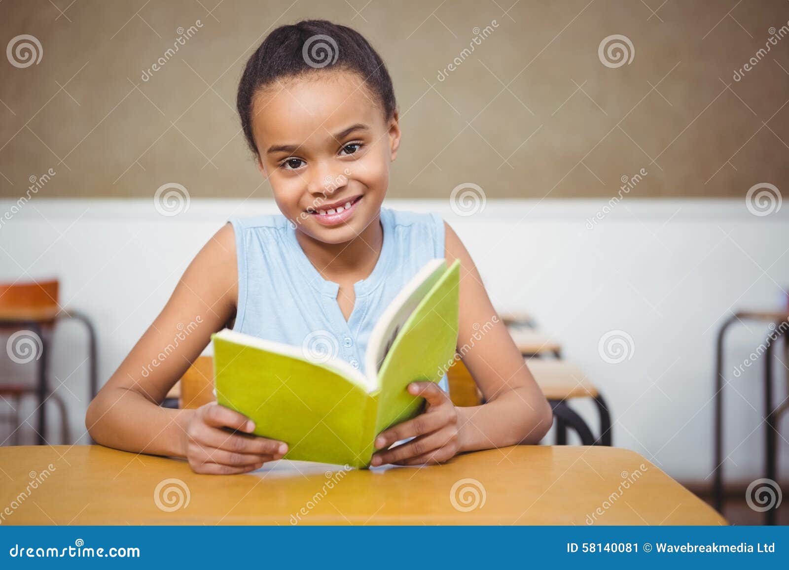 Smiling Student Reading a Book Stock Image - Image of child, early ...