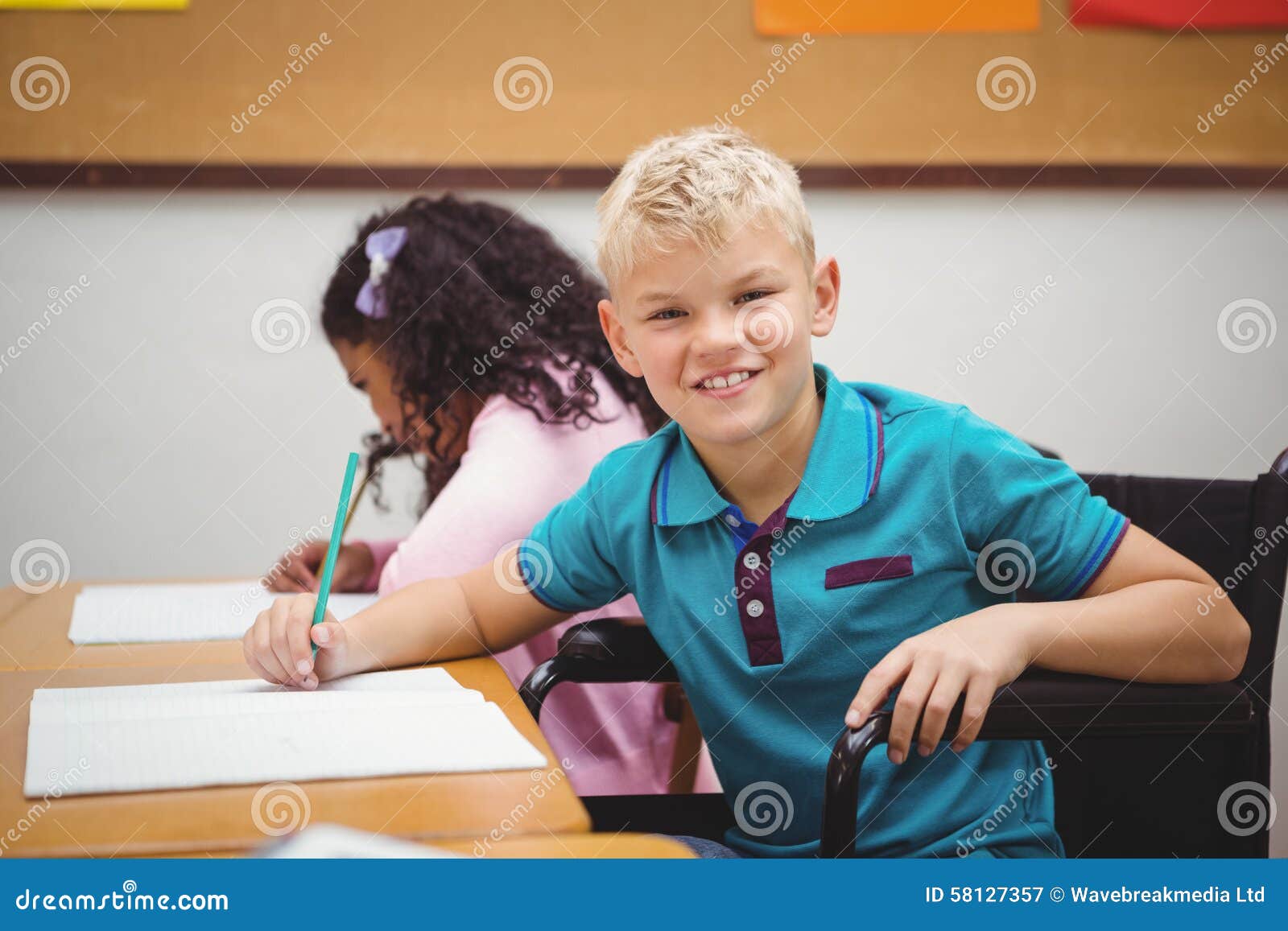 Smiling Student Sitting in Wheelchair Stock Image - Image of elementary ...