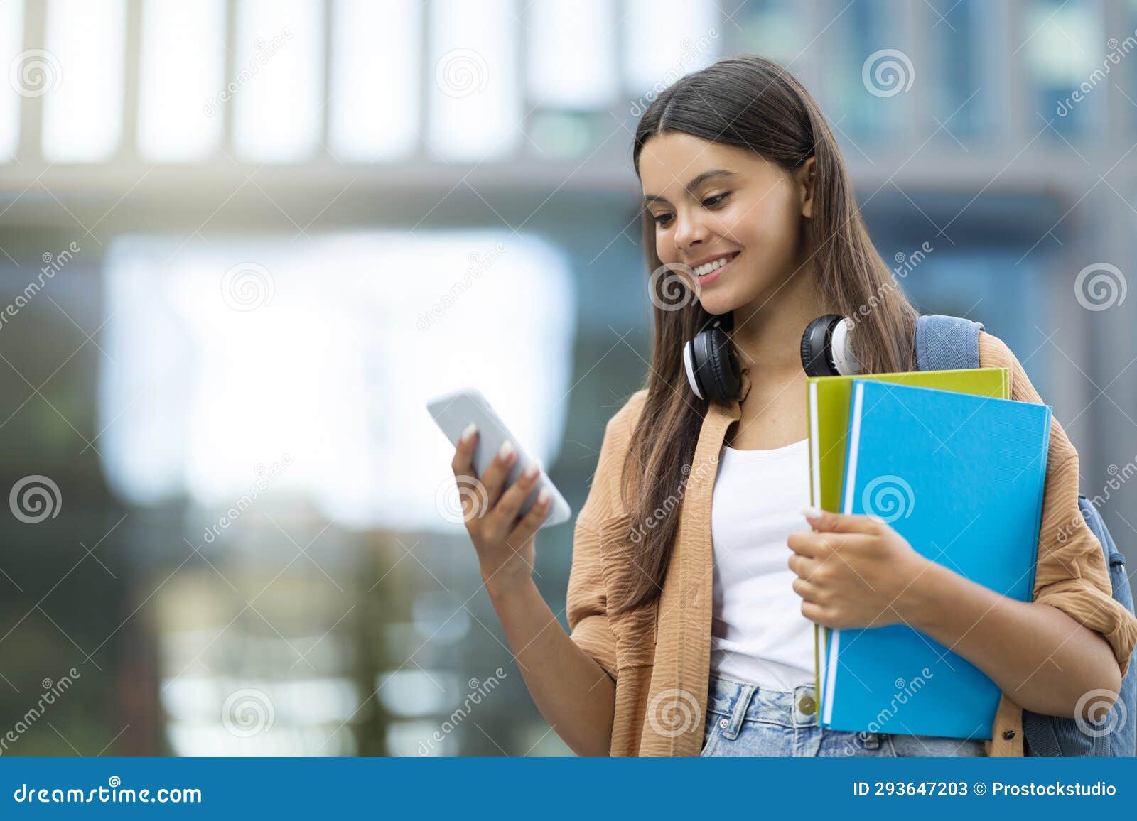 Smiling Student Using App on Smartphone, Campus Stock Image - Image of ...
