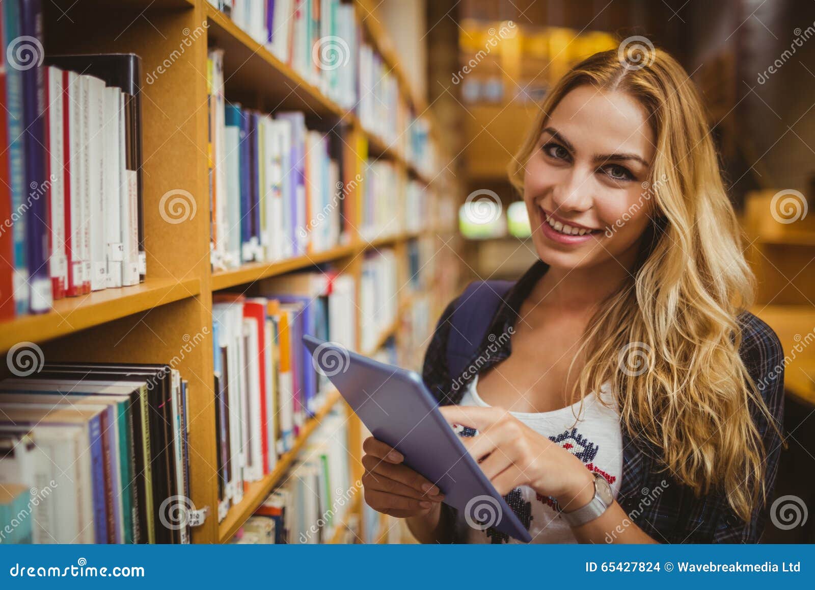 Smiling Student Using Her Tablet Stock Photo - Image of school, college ...