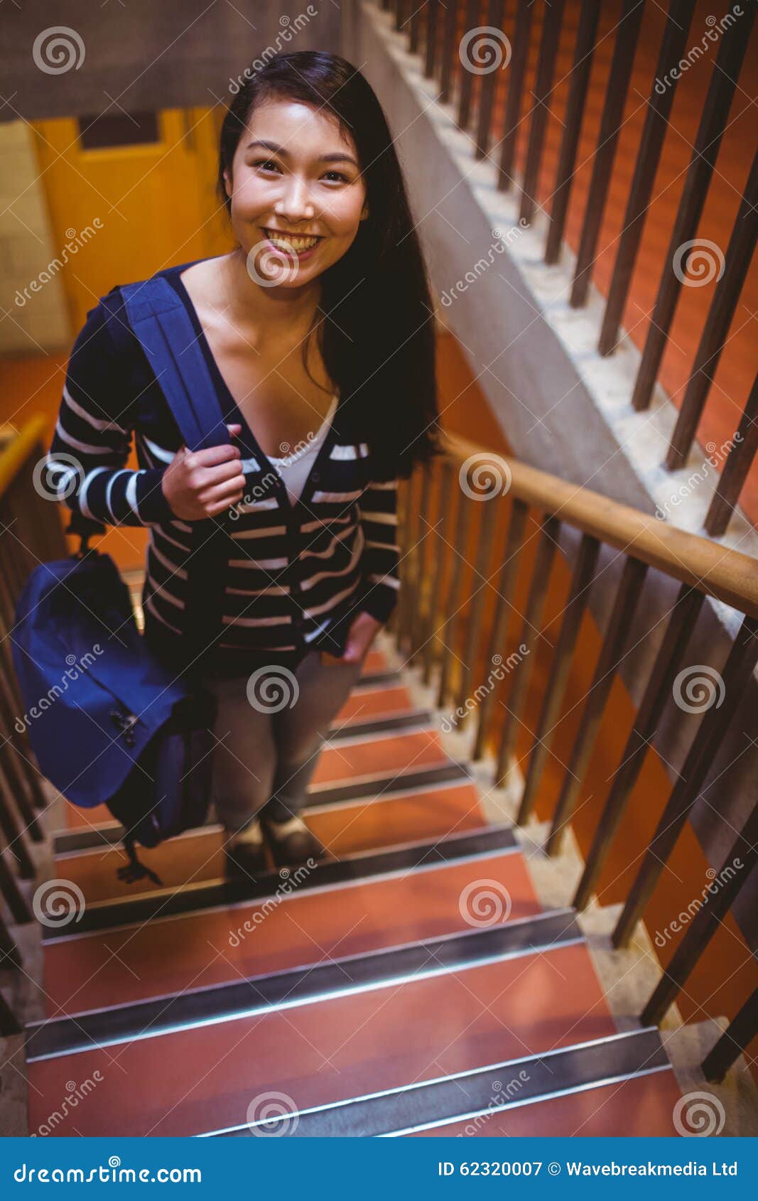 Smiling Student Walking Up Steps Stock Image - Image of education ...
