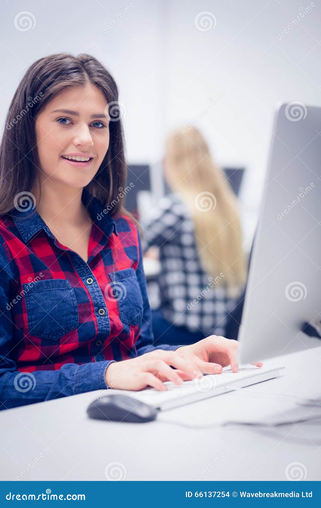Smiling Student Working on Computer Stock Photo - Image of girl, exam ...