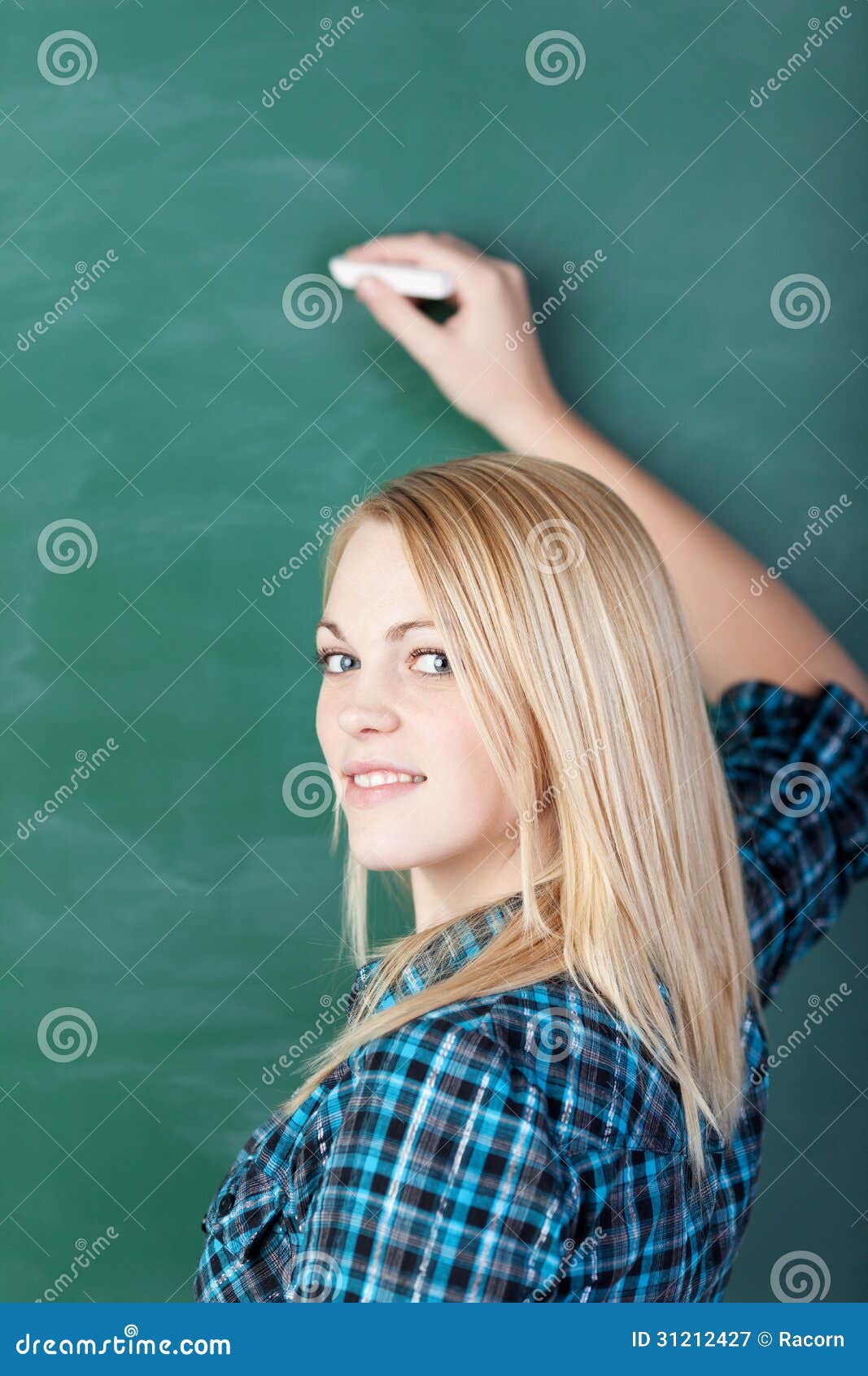 Smiling Student Writing on Blackboard Stock Image - Image of caucasian ...