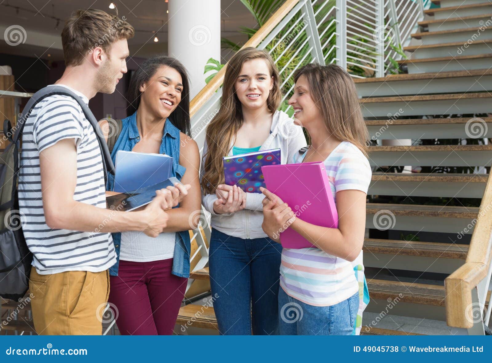 Smiling Students Chatting Together Outside Stock Photo - Image of adult ...