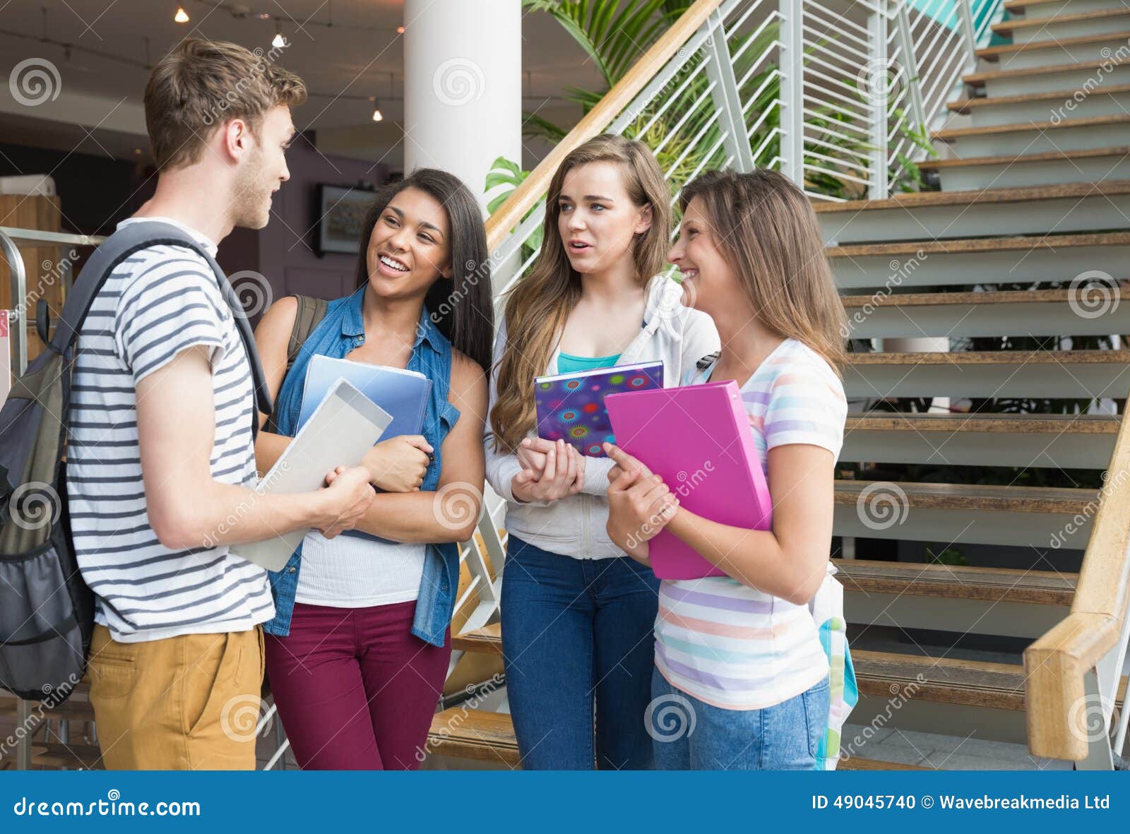 Smiling Students Chatting Together Outside Stock Photo - Image of ...