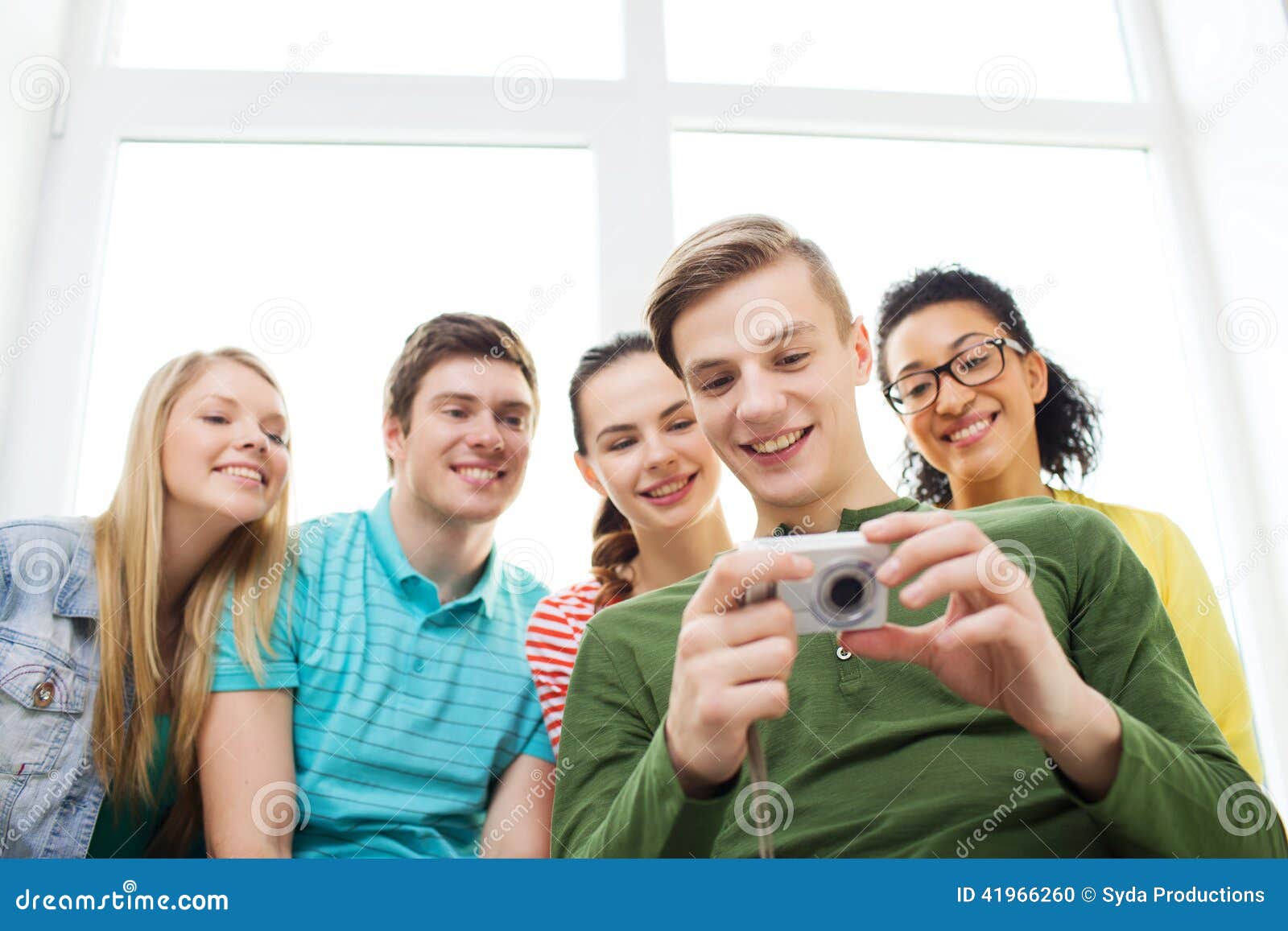 Smiling Students with Digital Camera at School Stock Photo - Image of ...