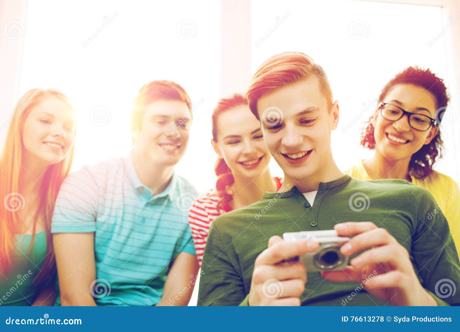 Smiling Students with Digital Camera at School Stock Photo - Image of ...