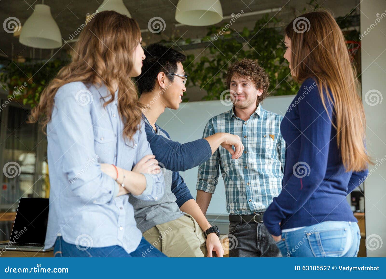 Smiling Students Enjoyng Conversation in Classroom Stock Image - Image ...