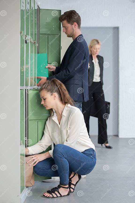 Smiling Students Getting Courses Inside Locker at University Stock Photo - Image of educational ...