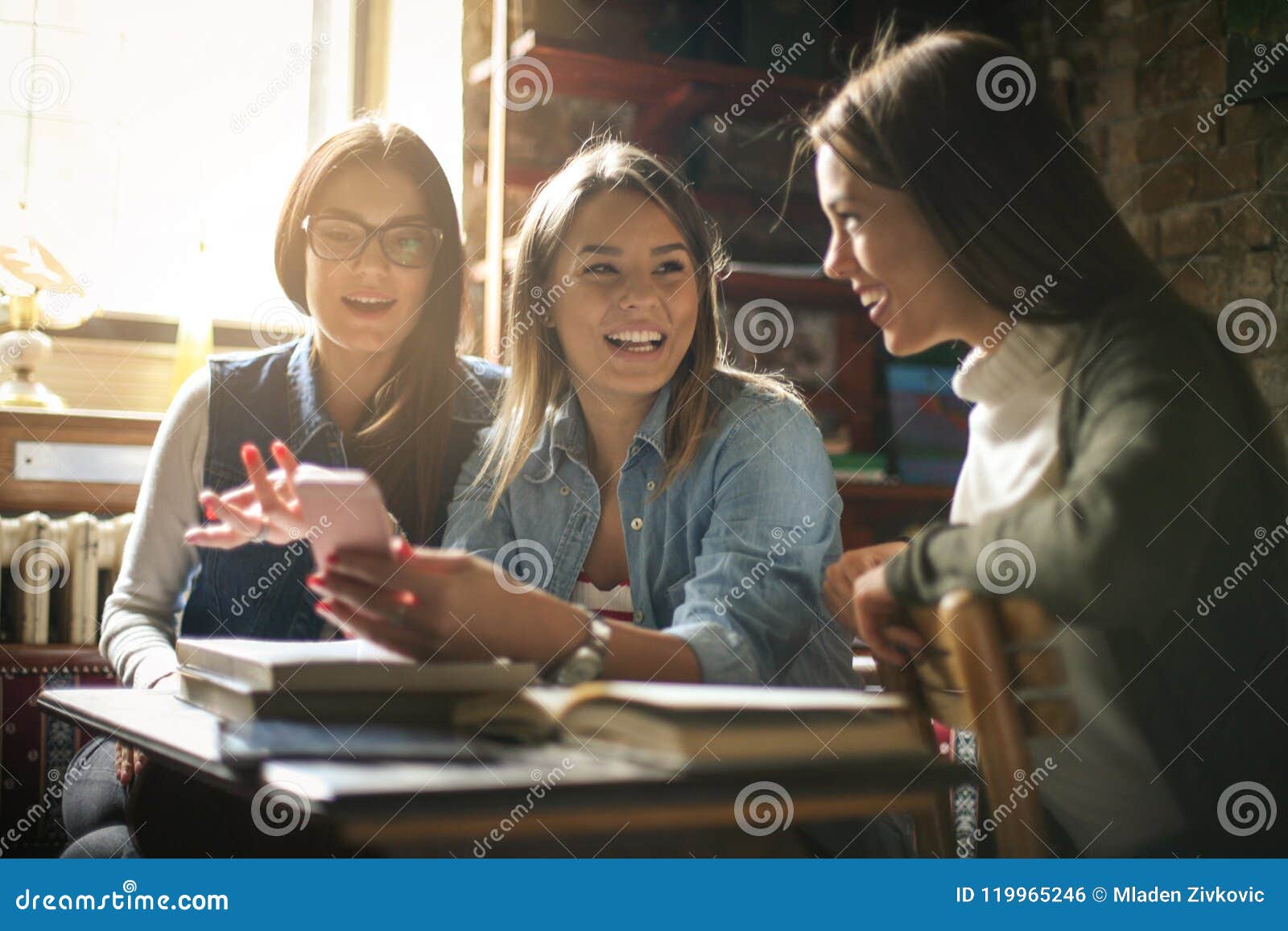 Smiling Students Girls Having Conversation and Using Smart Stock Photo ...