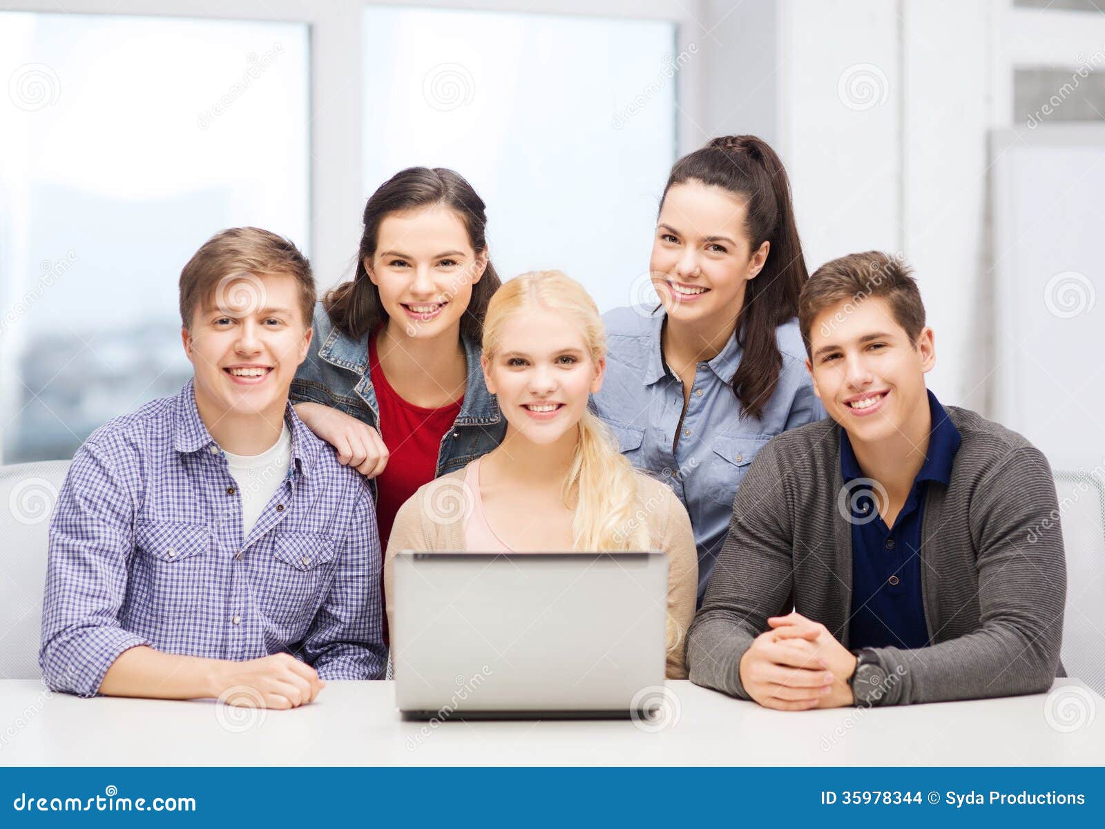 Smiling Students with Laptop at School Stock Photo - Image of looking ...