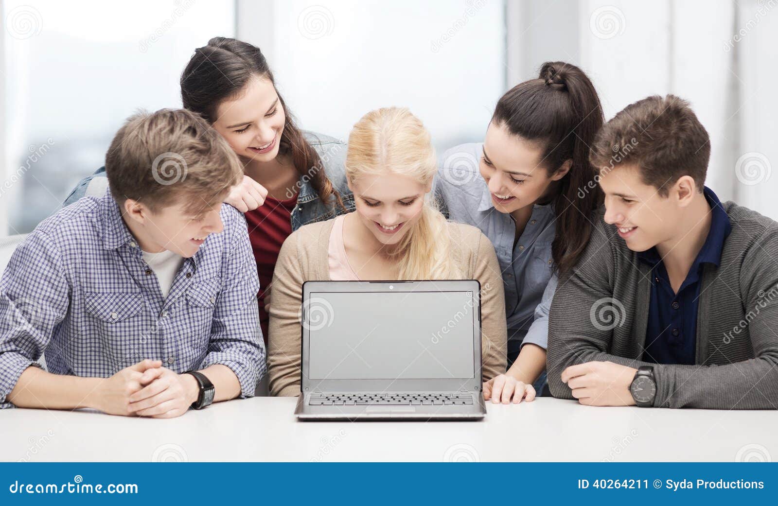 Smiling Students Looking at Blank Lapotop Screen Stock Image - Image of ...
