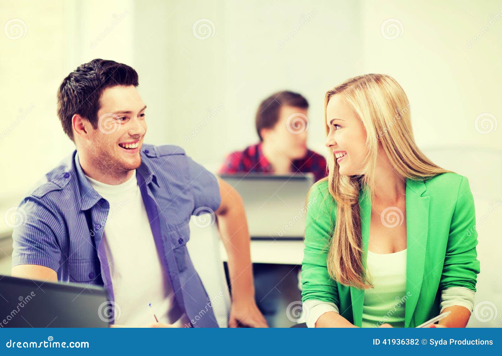 Smiling Students Looking at Each Other at School Stock Photo - Image of ...
