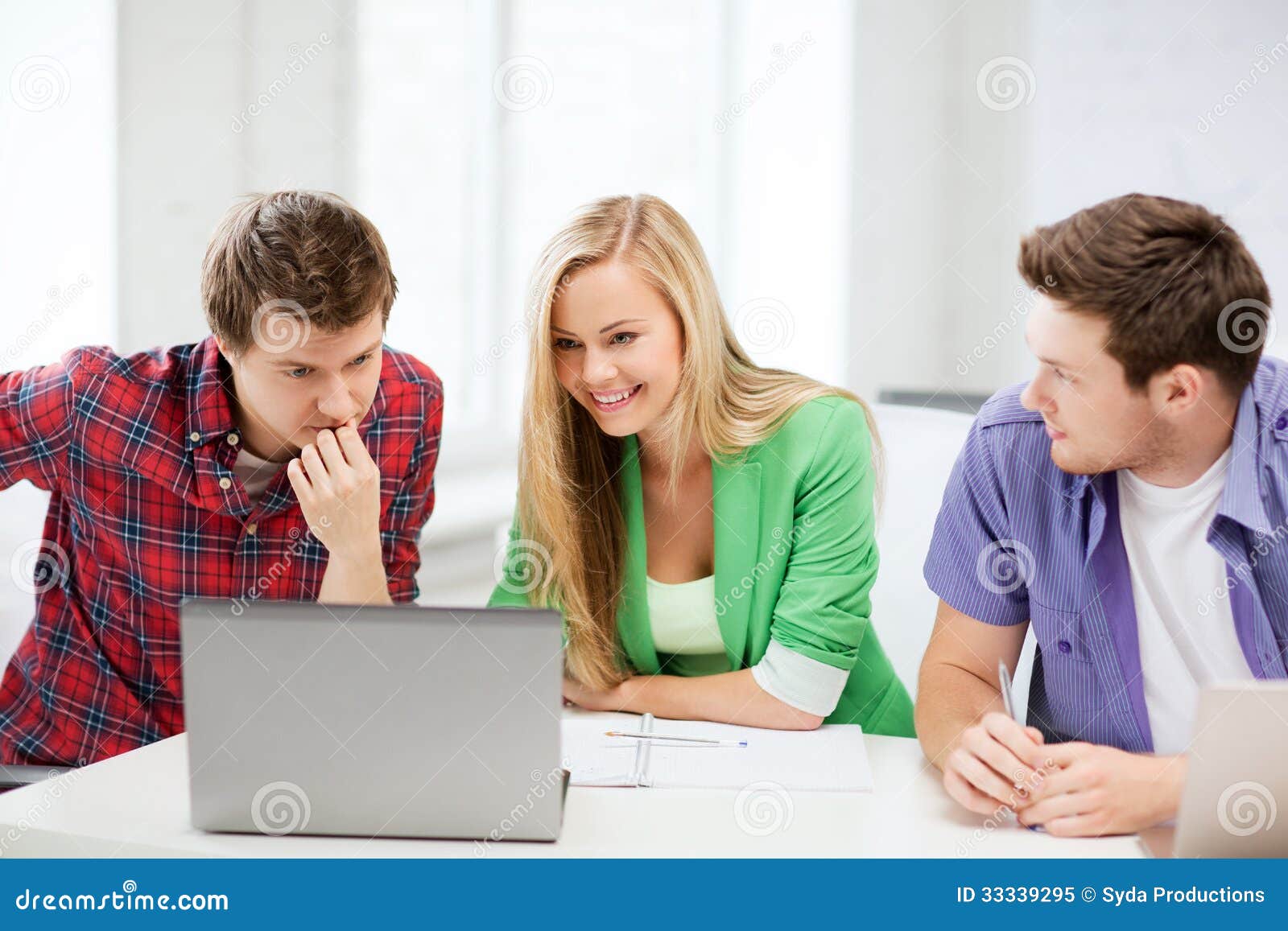 Smiling Students Looking at Laptop at School Stock Image - Image of ...