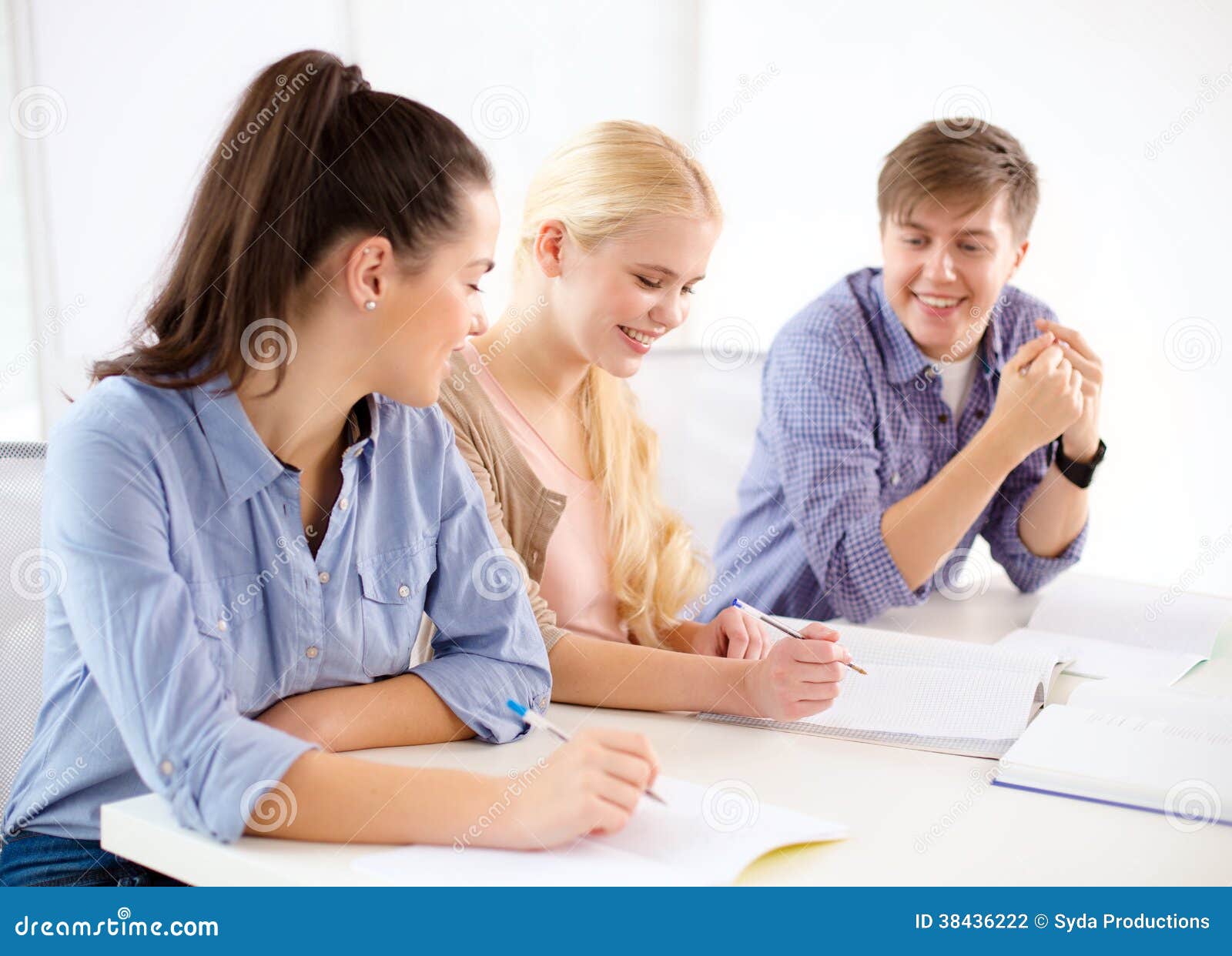 Smiling Students with Notebooks at School Stock Photo - Image of class ...