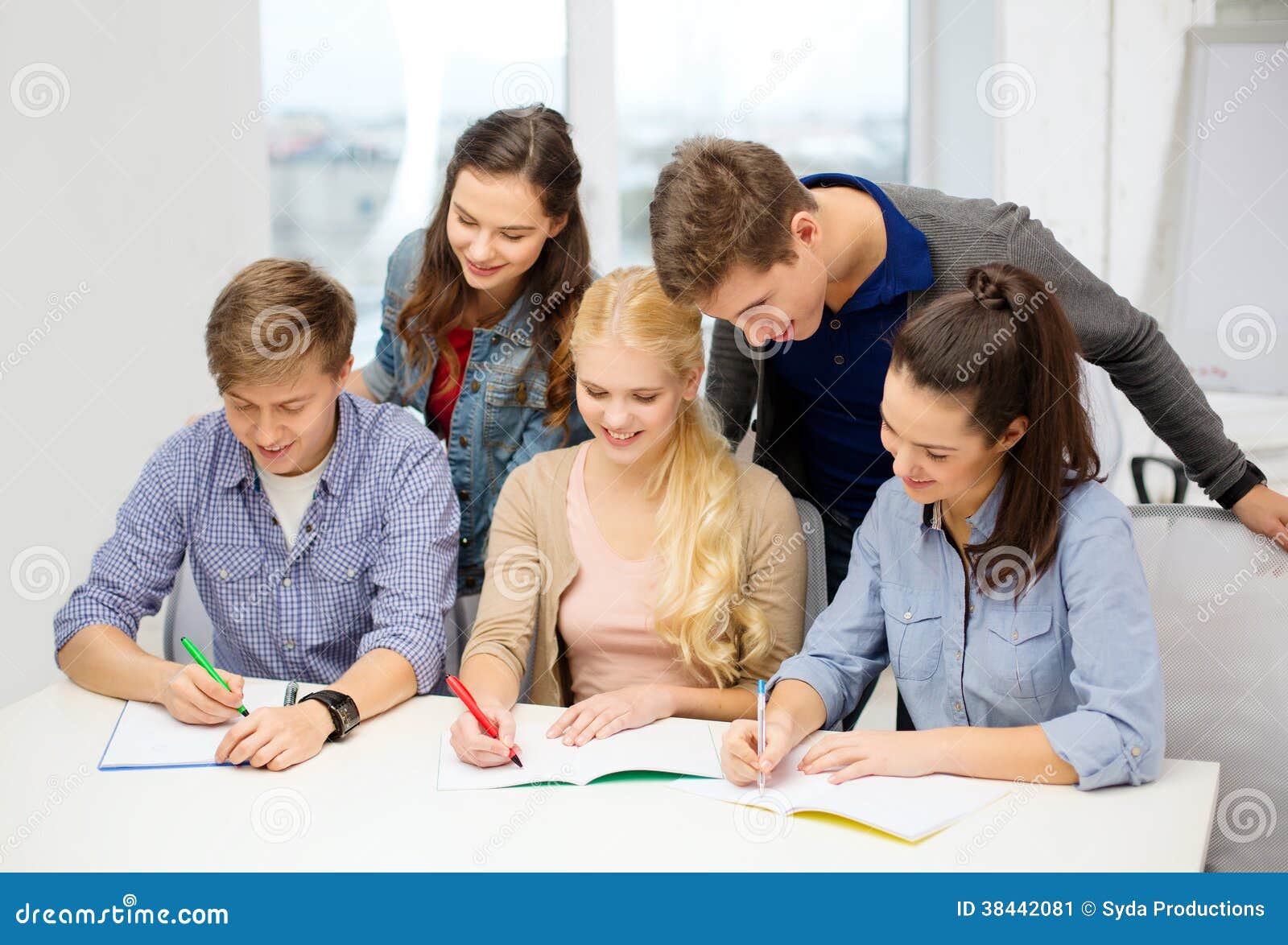 Smiling Students with Notebooks at School Stock Image - Image of nice ...