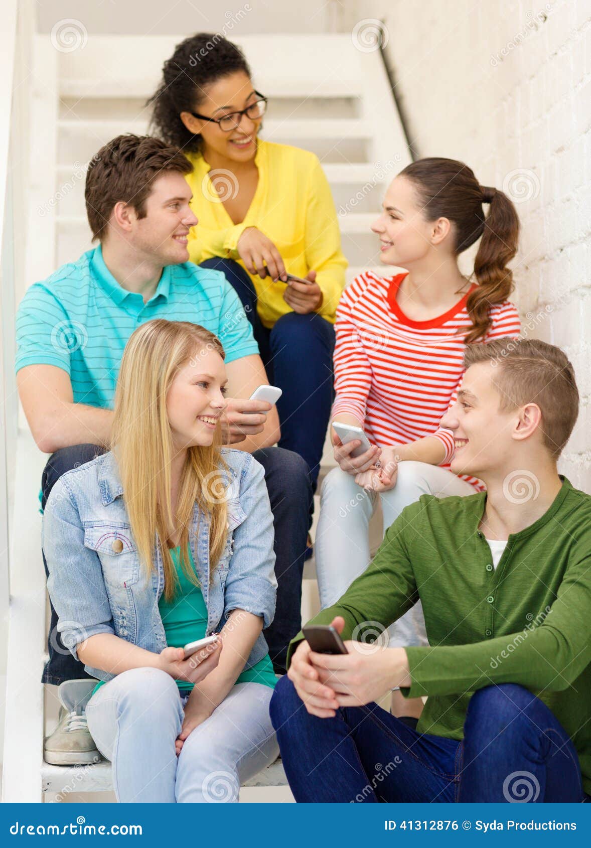 Smiling Students with Smartphone Having Discussion Stock Photo - Image ...