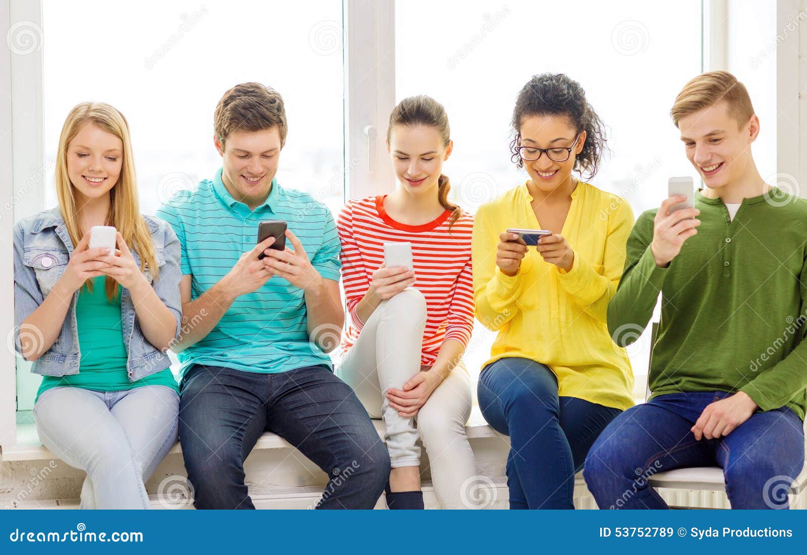 Smiling Students with Smartphone Texting at School Stock Image - Image ...