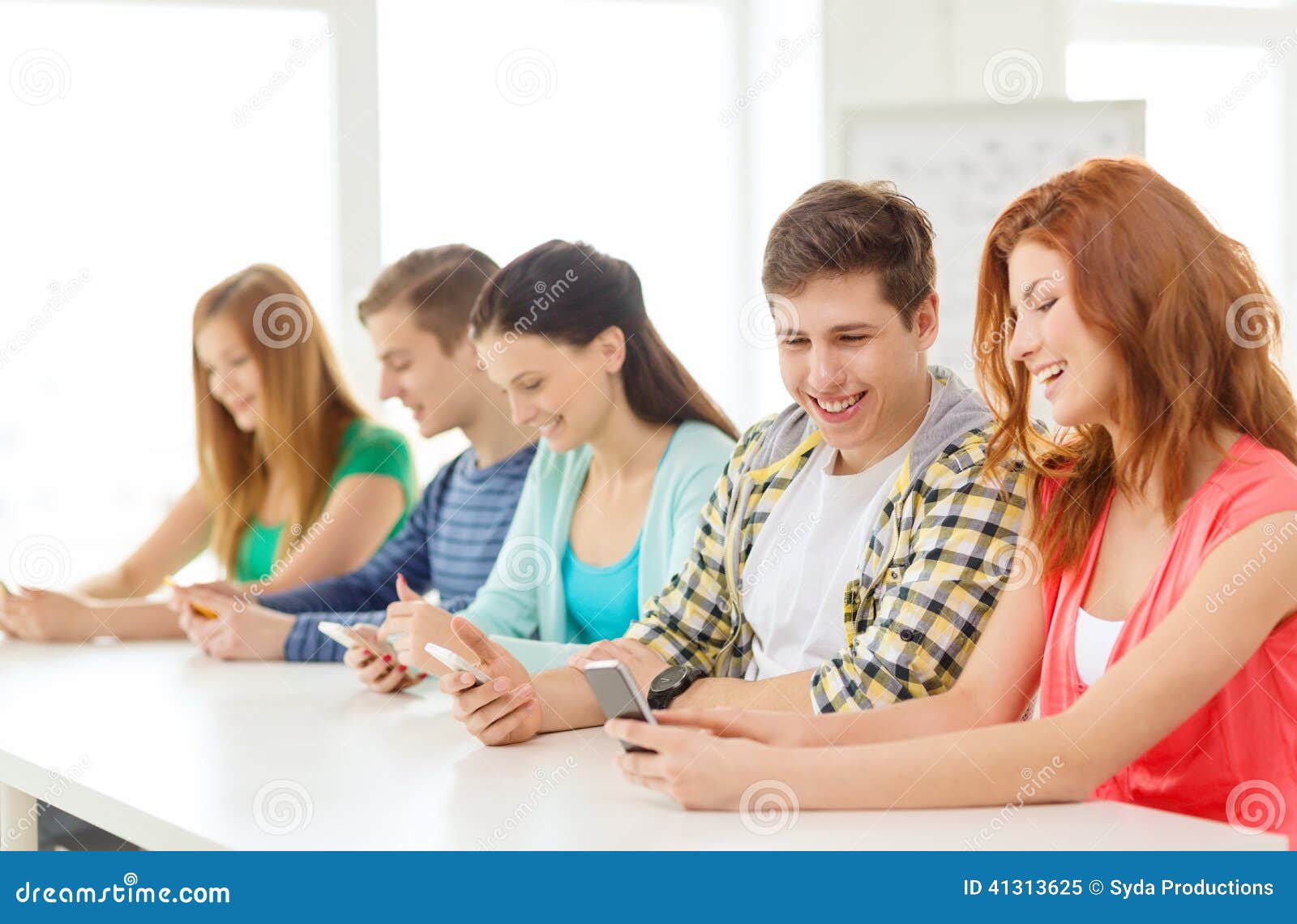 Smiling Students with Smartphones at School Stock Image - Image of ...