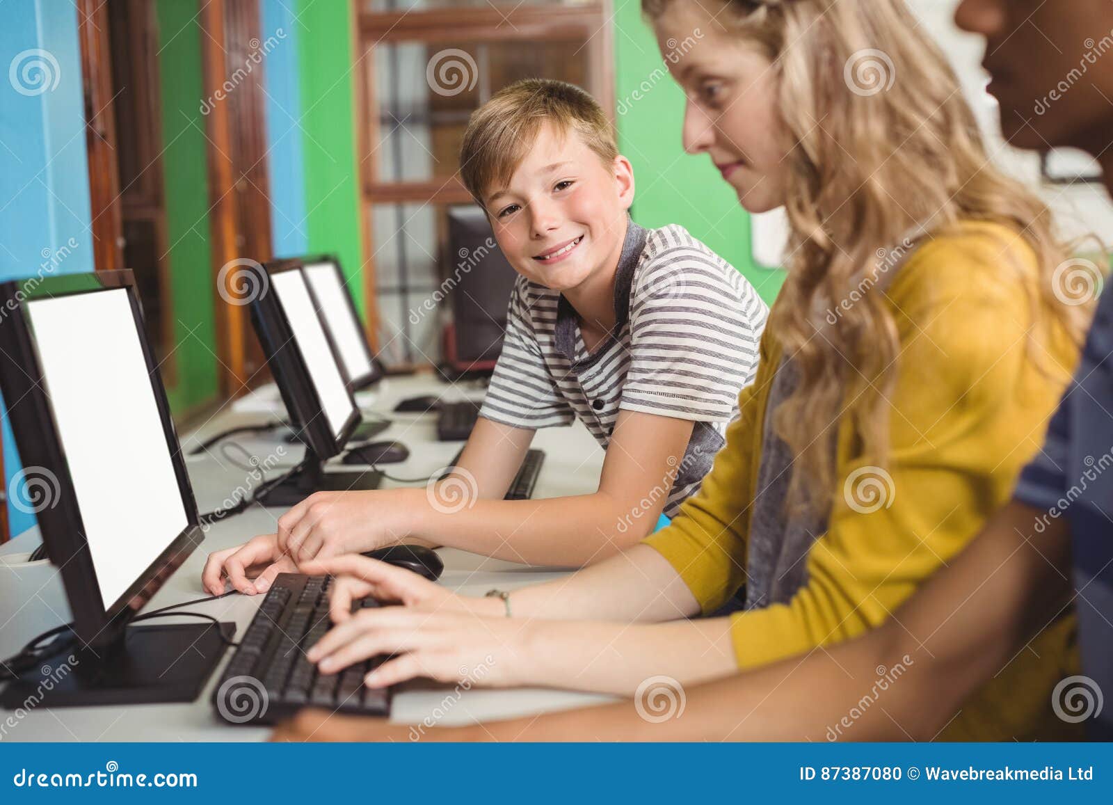 Smiling Students Studying in Computer Classroom Stock Photo - Image of ...