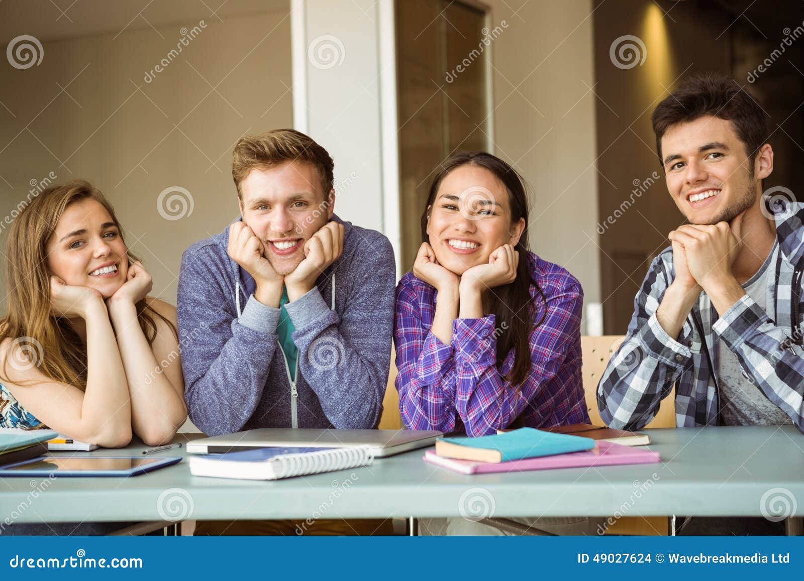 Smiling Students Studying Together and Look at Camera Stock Photo ...