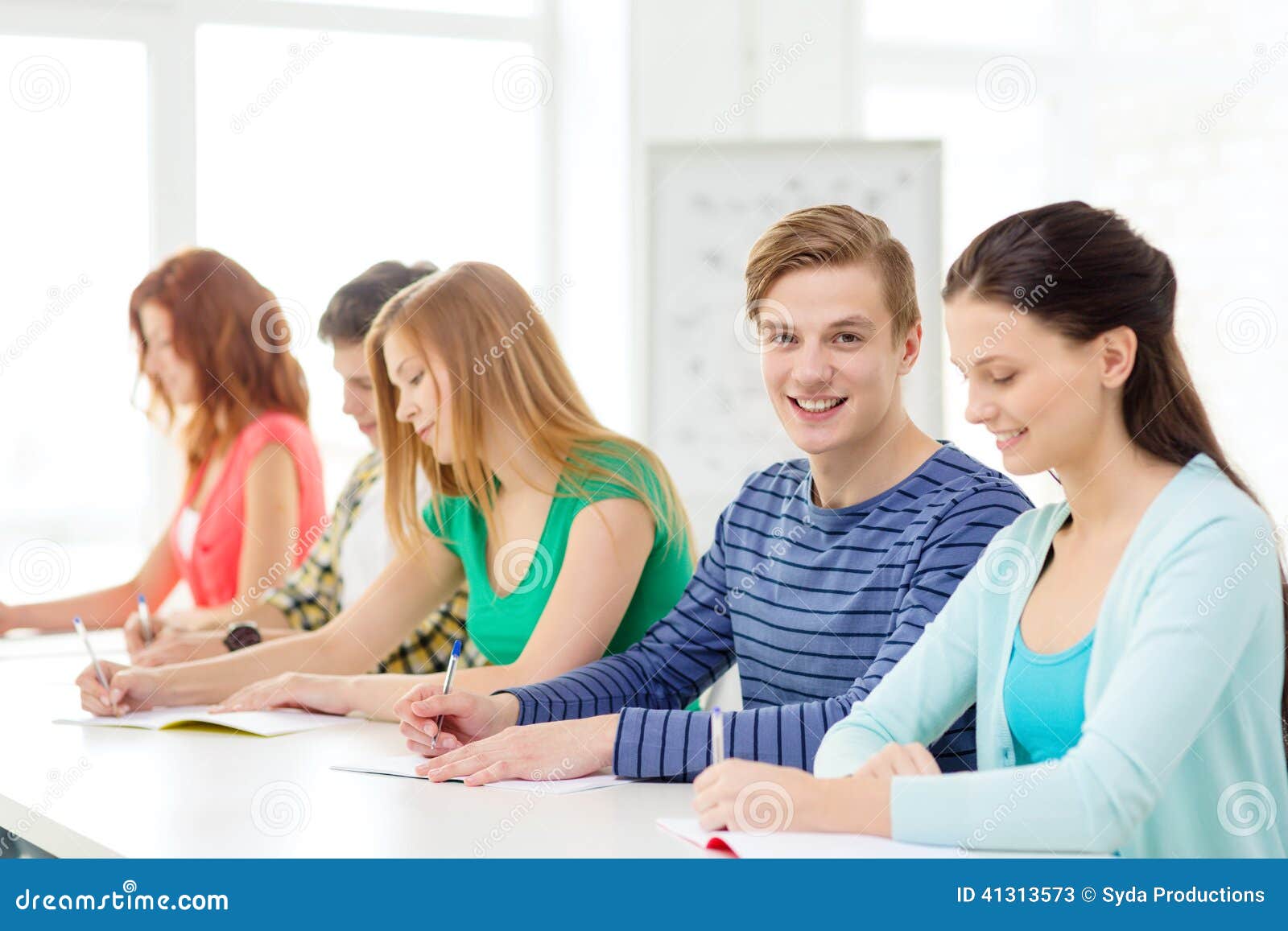 Smiling Students with Textbooks at School Stock Image - Image of nice ...