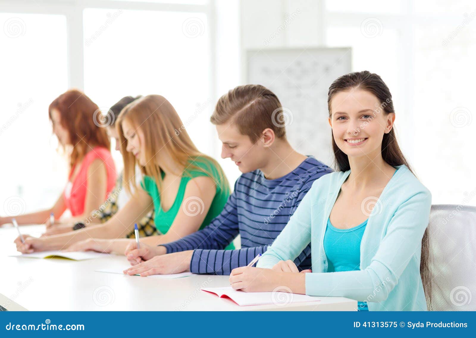 Smiling Students with Textbooks at School Stock Image - Image of ...