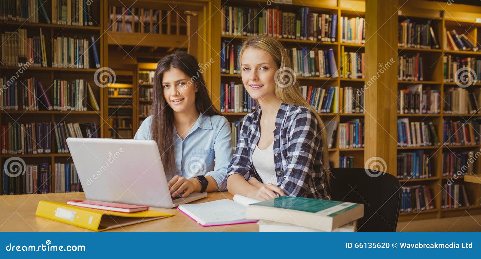 Smiling Students Using Laptop Stock Photo - Image of educational ...
