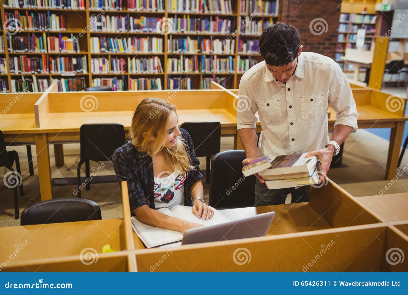 Smiling Students Working Together while Sitting at Table Stock Image ...
