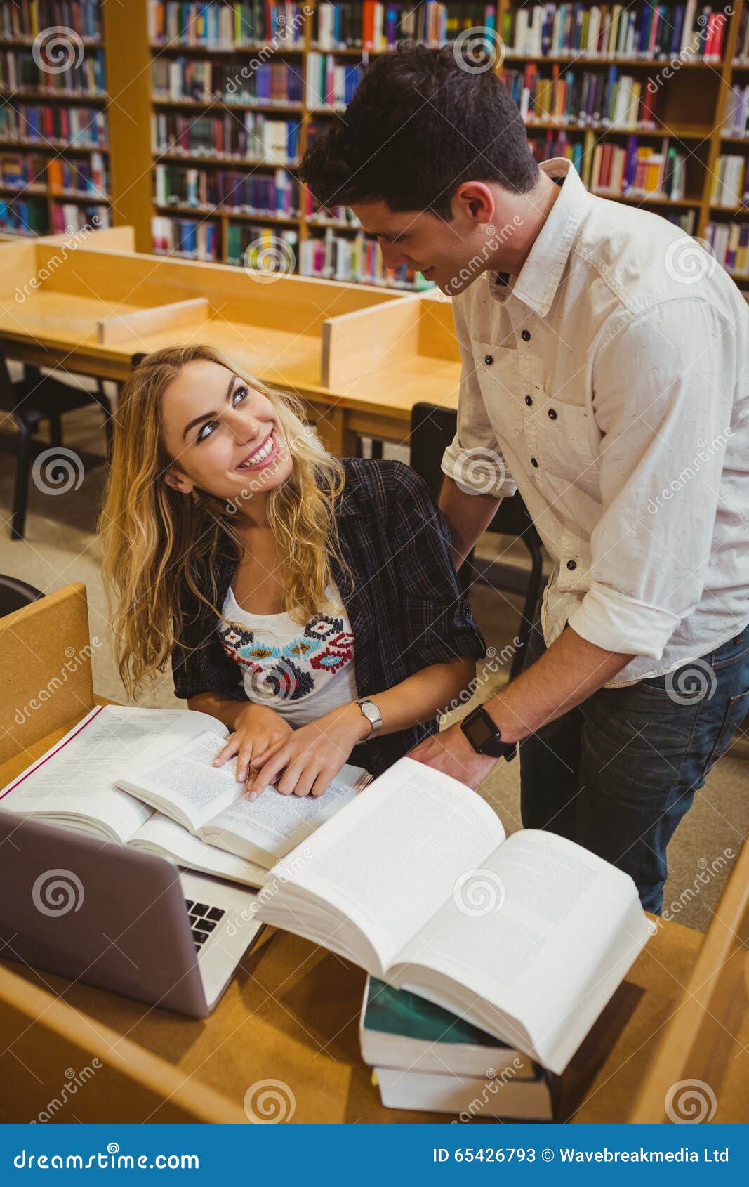 Smiling Students Working Together while Sitting at Table Stock Image ...