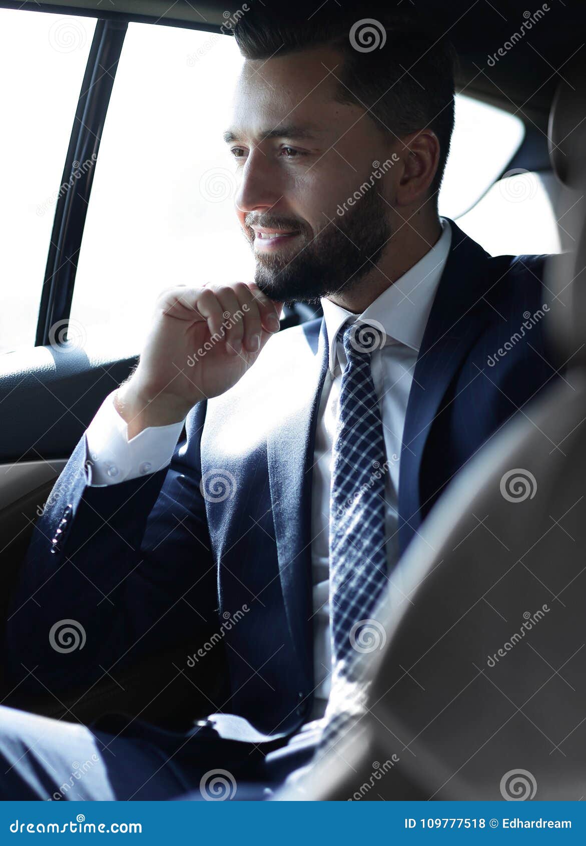 Smiling Business Man Sitting in the Back Seat of a Car Stock Photo ...