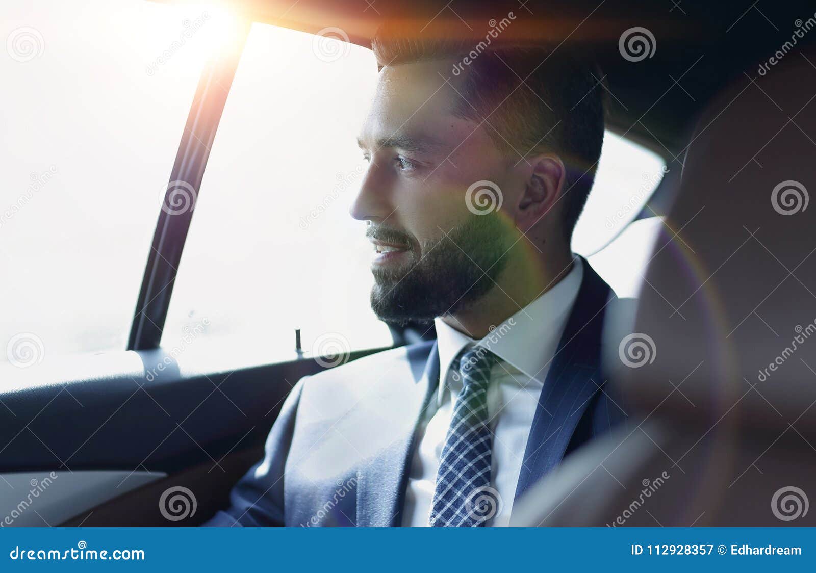 Smiling Business Man Sitting in the Back Seat of a Car Stock Image ...