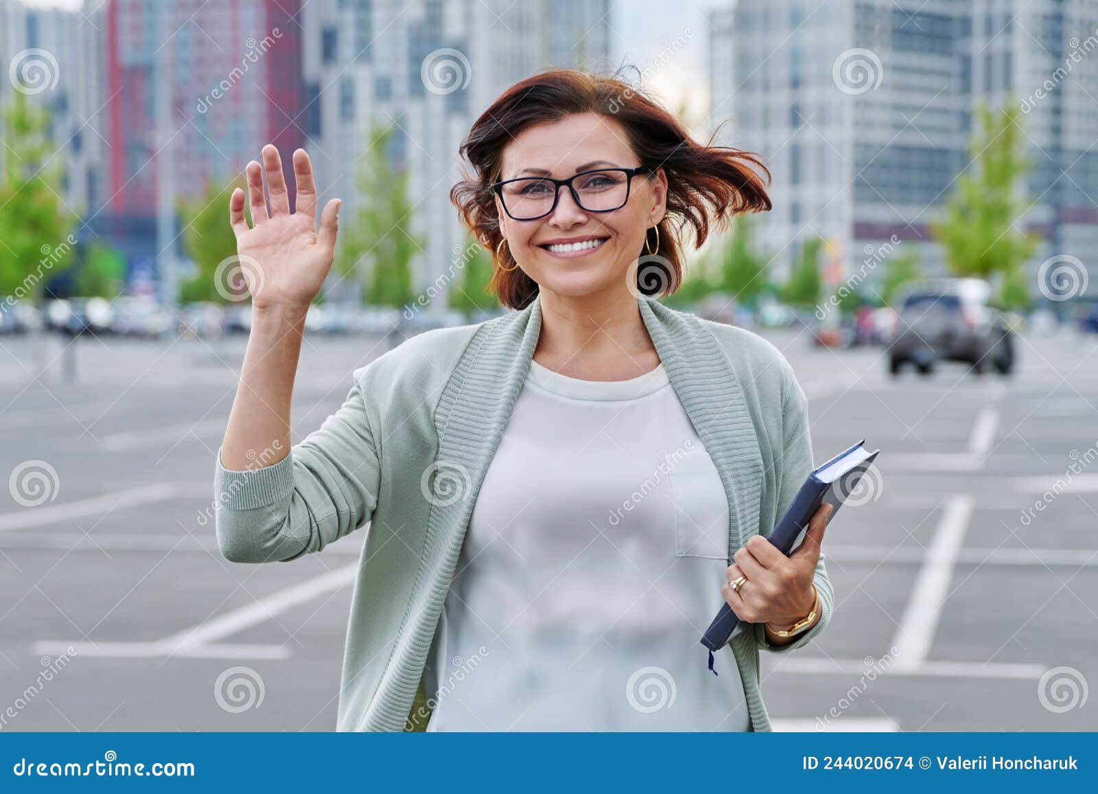 Smiling Successful Mature Business Woman Walking Outdoor, Modern Urban ... Smiling Successful Mature Business Woman Walking Outdoor, Modern Urban ...