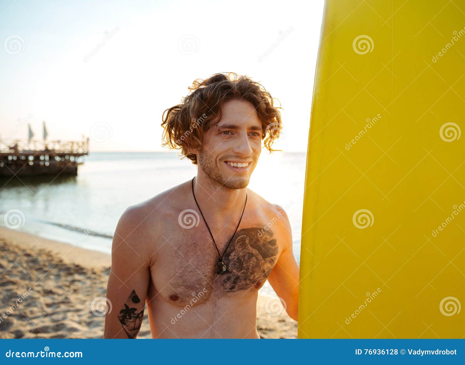 Smiling Surfer Holding Surf Board while Standing at the Beach Stock ...