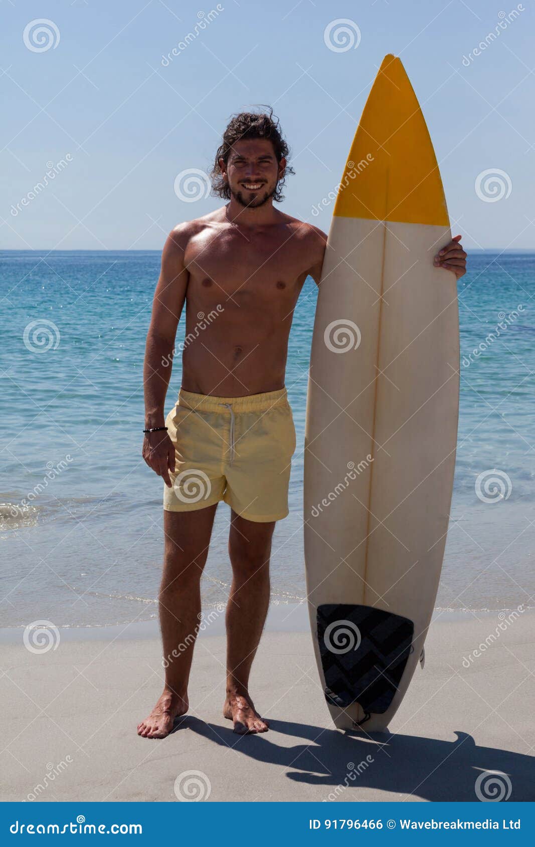 Smiling Surfer with Surfboard Standing at Beach Coast Stock Photo ...