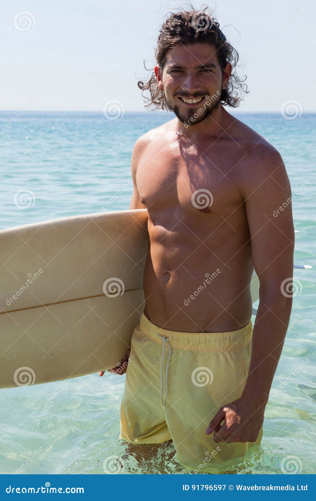 Smiling Surfer with Surfboard Standing at Beach Coast Stock Image ...