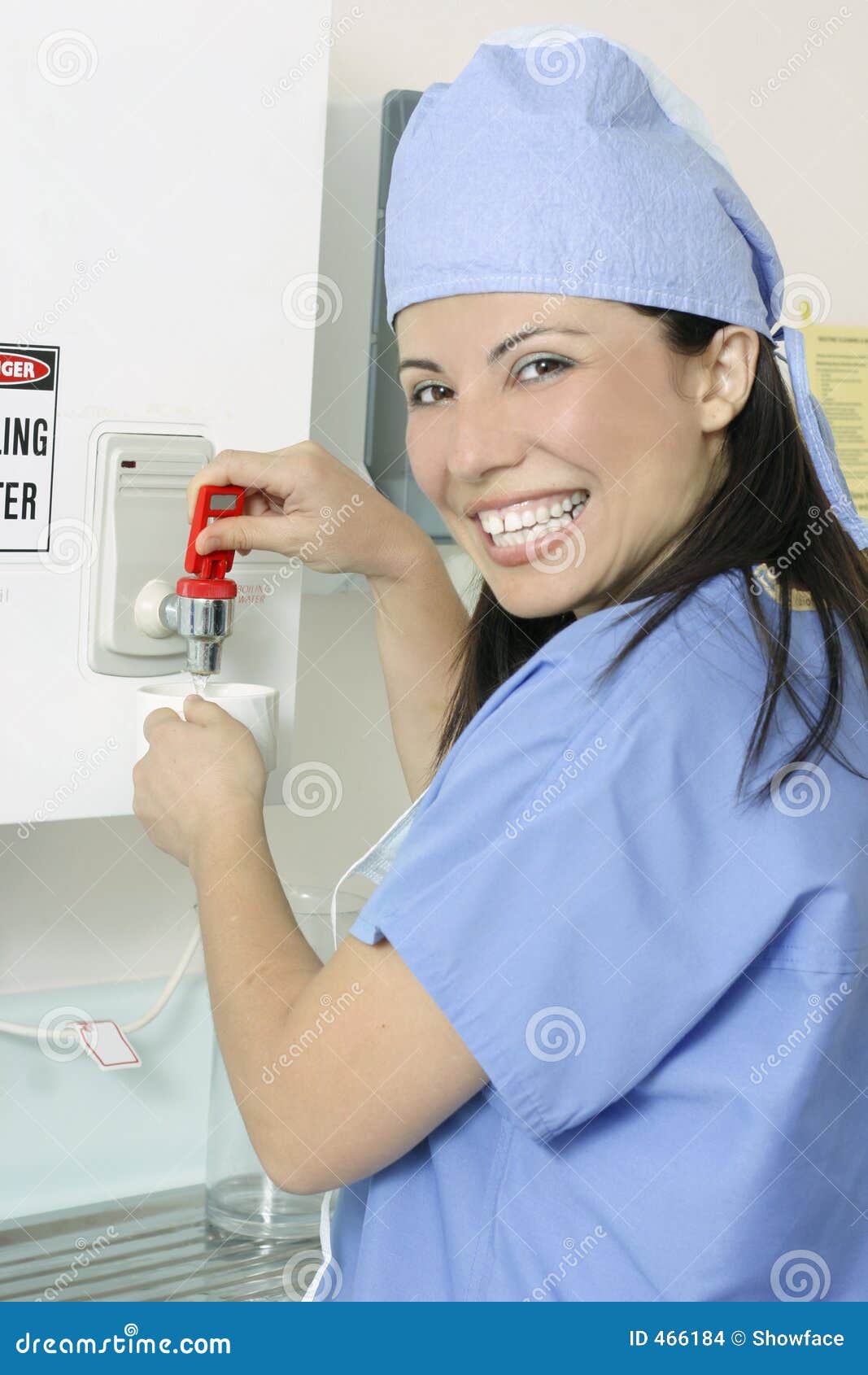 Smiling Surgeon Making Drink Stock Photo - Image of preparing, looking ...