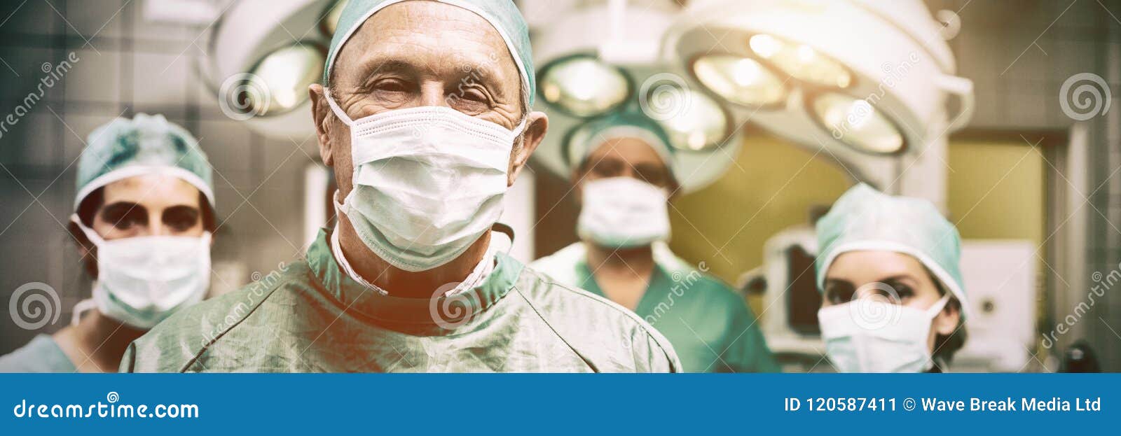 Smiling Surgeon Posing with a Team Stock Image - Image of intern ...